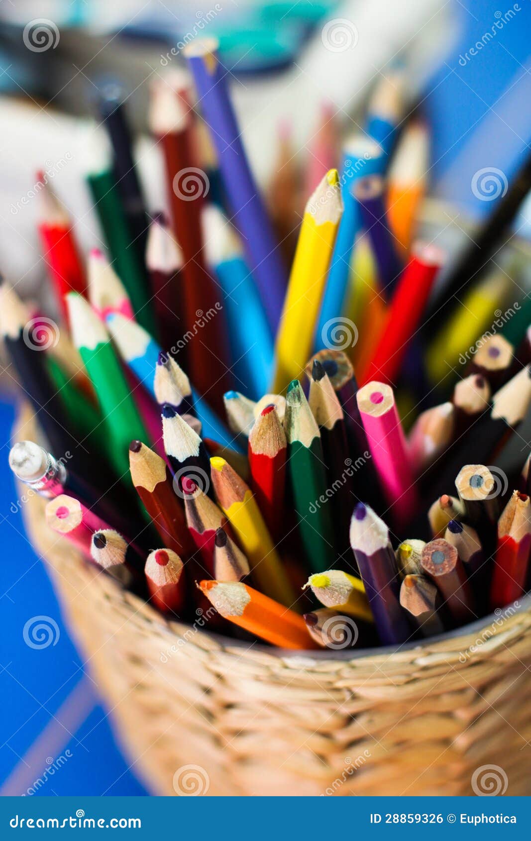 Colored pencils in basket stock photo. Image of instruments - 28859326