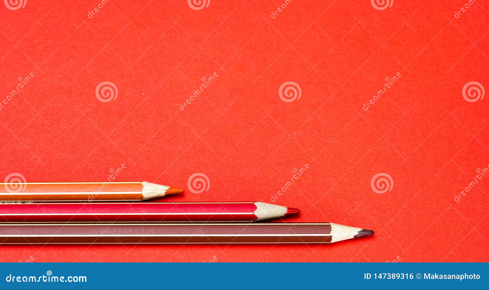 Colored Pencils on a Bright Red Background Stock Photo - Image of ...