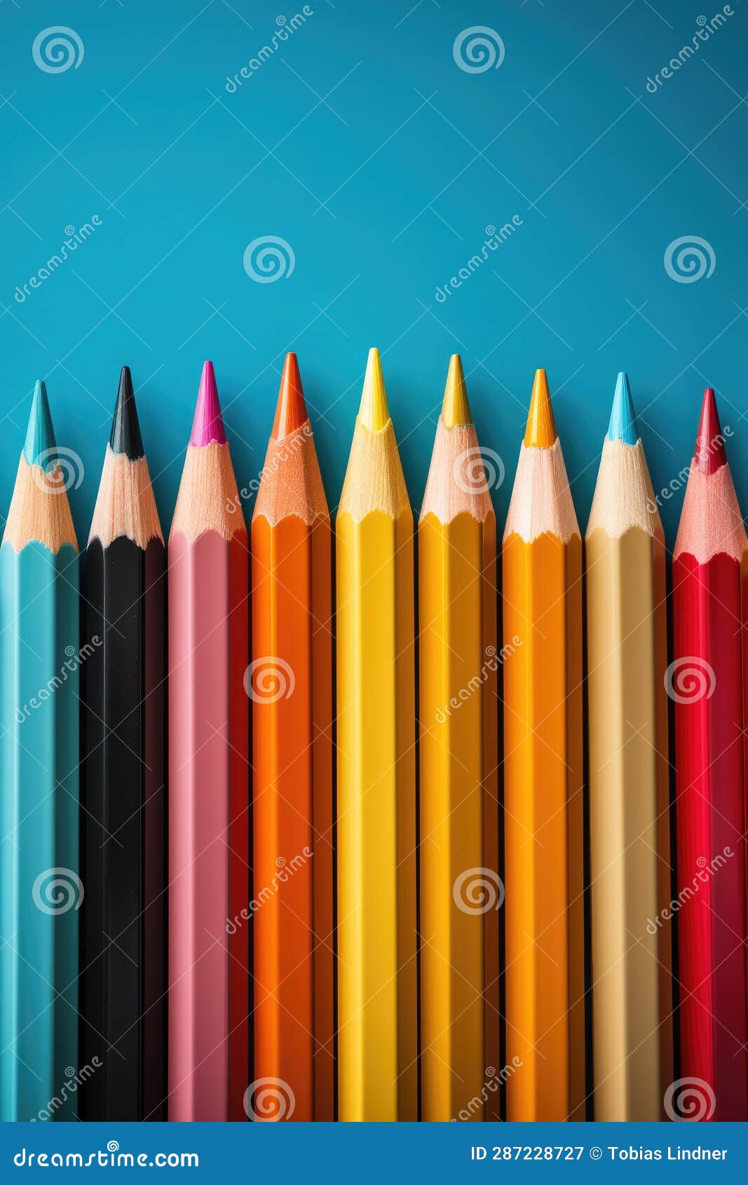 Colored Pencils or Crayons on Teal or Light Blue Background, Copy Space ...