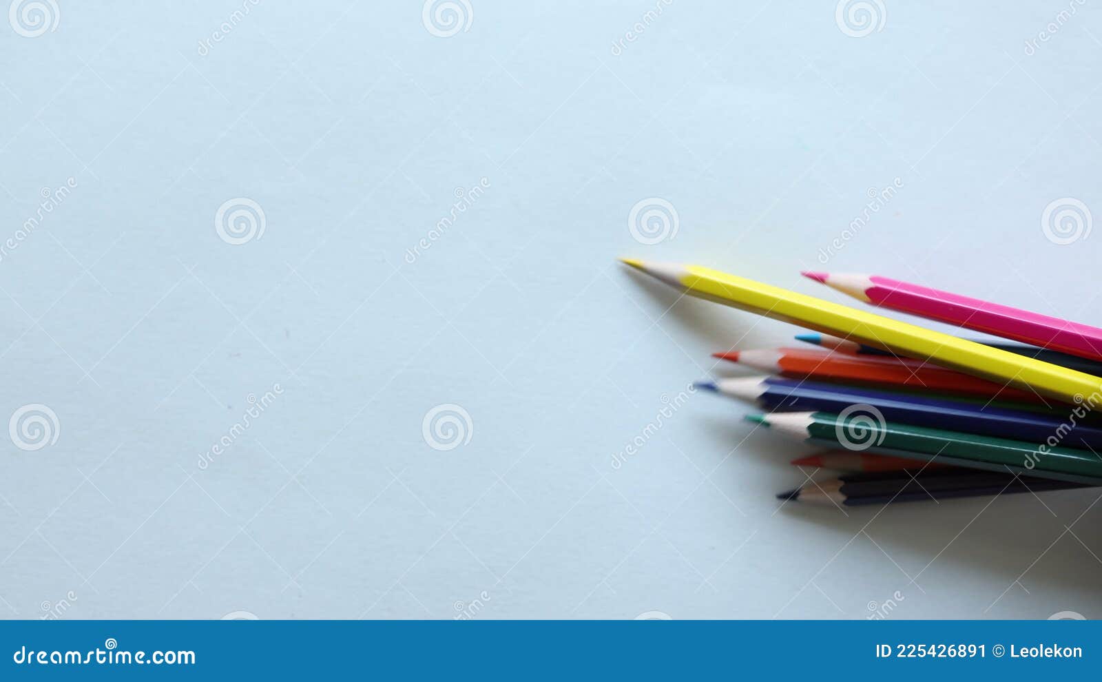 Colored Pencils Dropping on the Right Side of White Table Background ...
