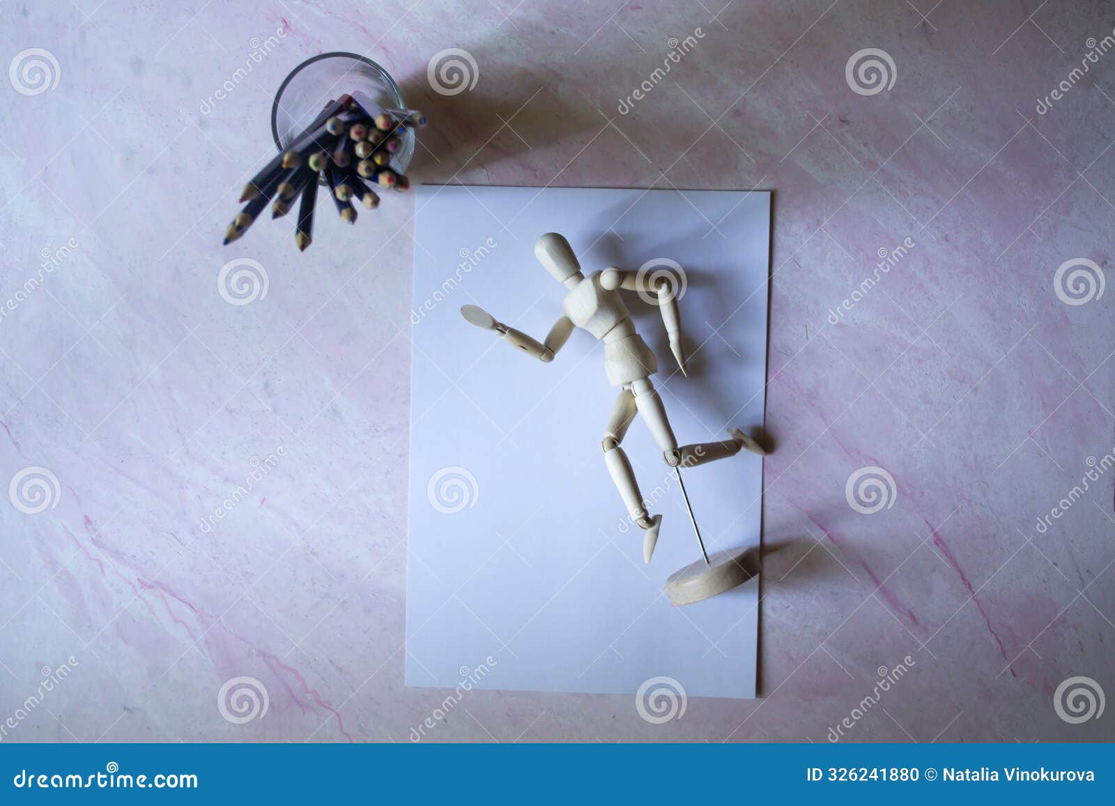 Colored Pencils, Empty Paper and Dummy for Sketching on the Table ...