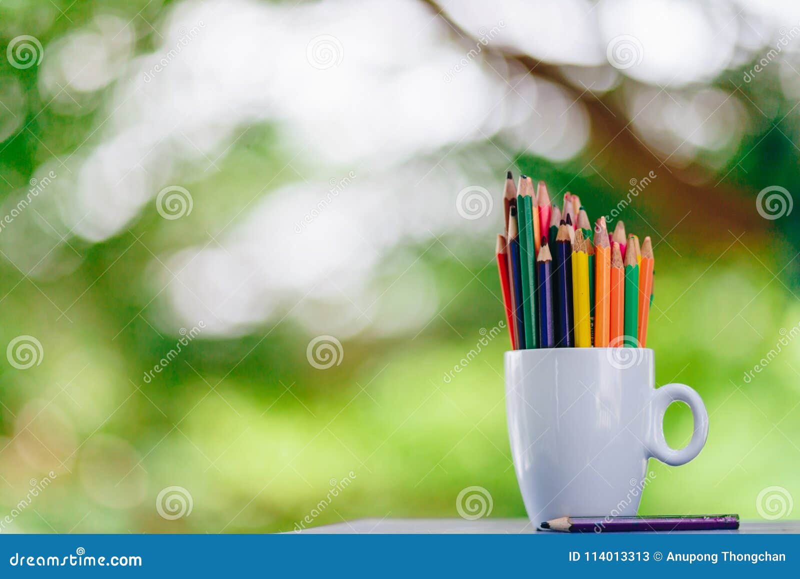 Colored Pencils in a Glass on Bokeh Background Stock Image - Image of ...