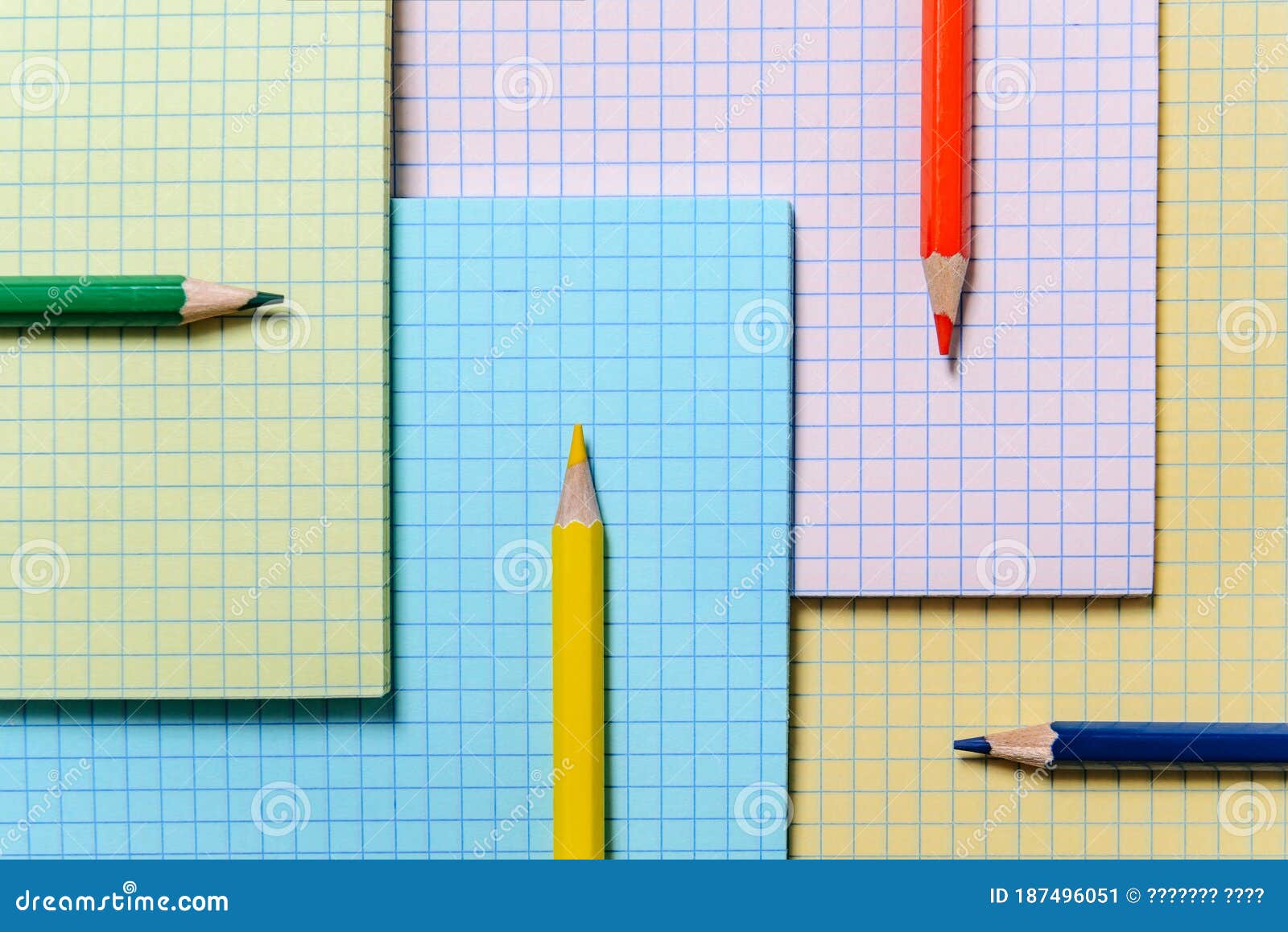 Colored Pencils Lie on the Background of Multi-colored Notebook Sheets ...