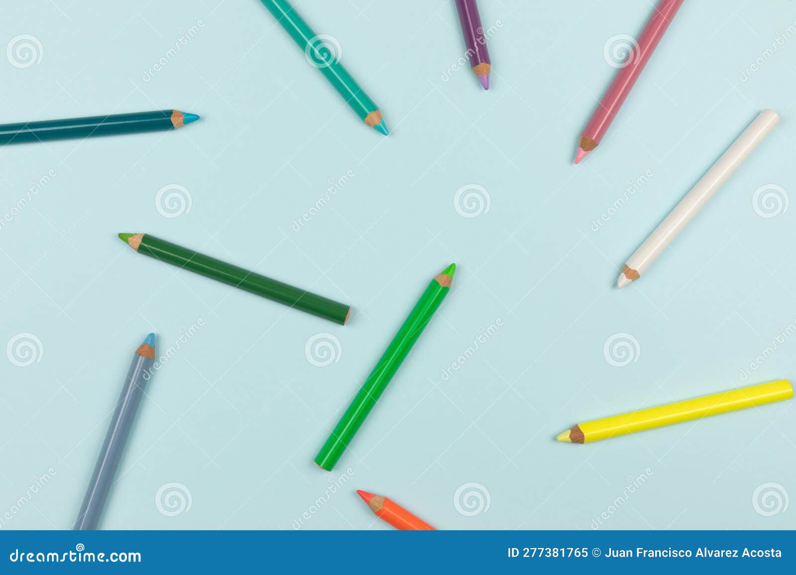 Colored Pencils on a Light Blue Background. Top View. Stock Image ...