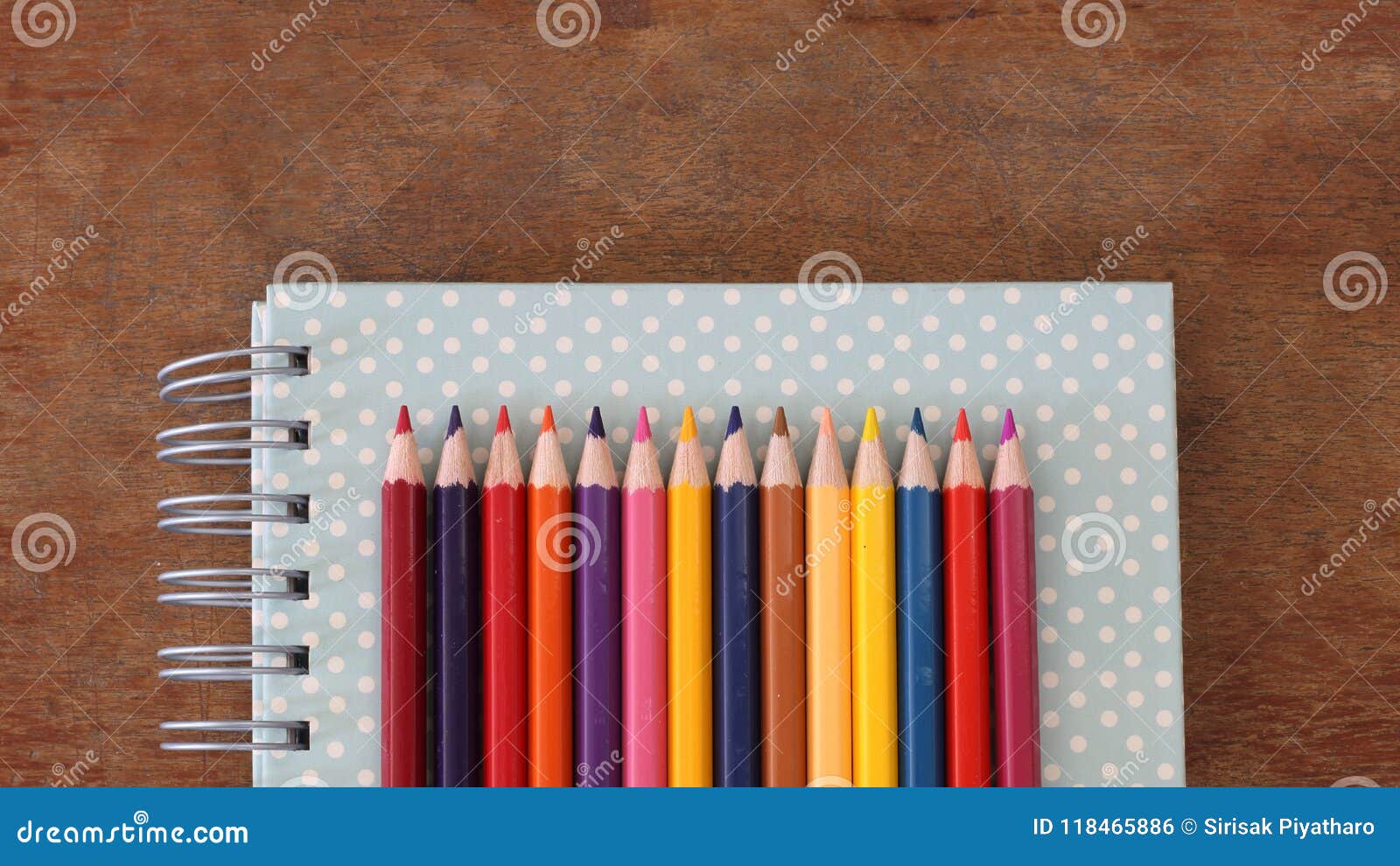 Colored Pencils are on Notebook Stock Photo - Image of color, sketch ...