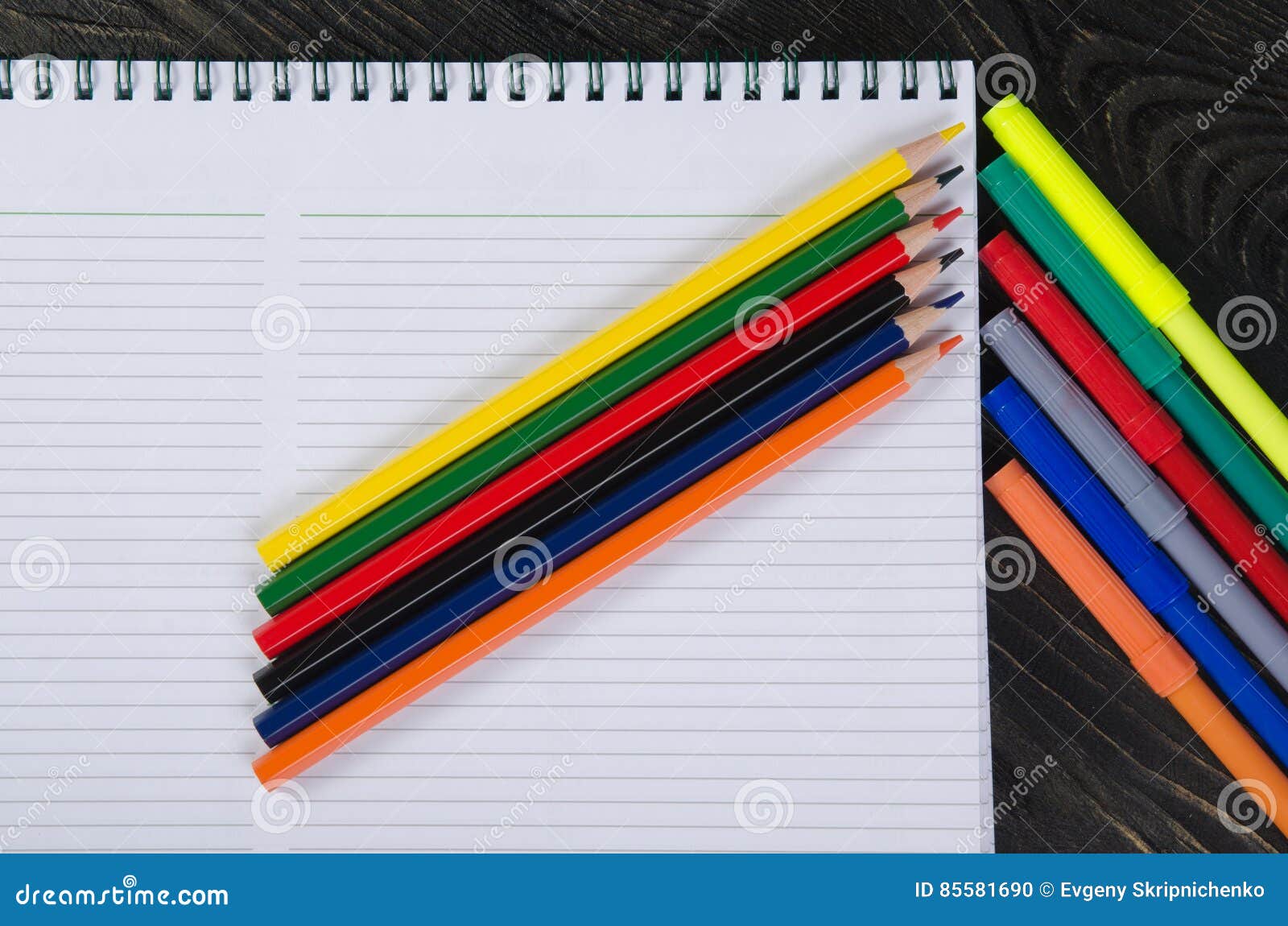 Colored Pencils and a Notebook Stock Photo - Image of design, business ...