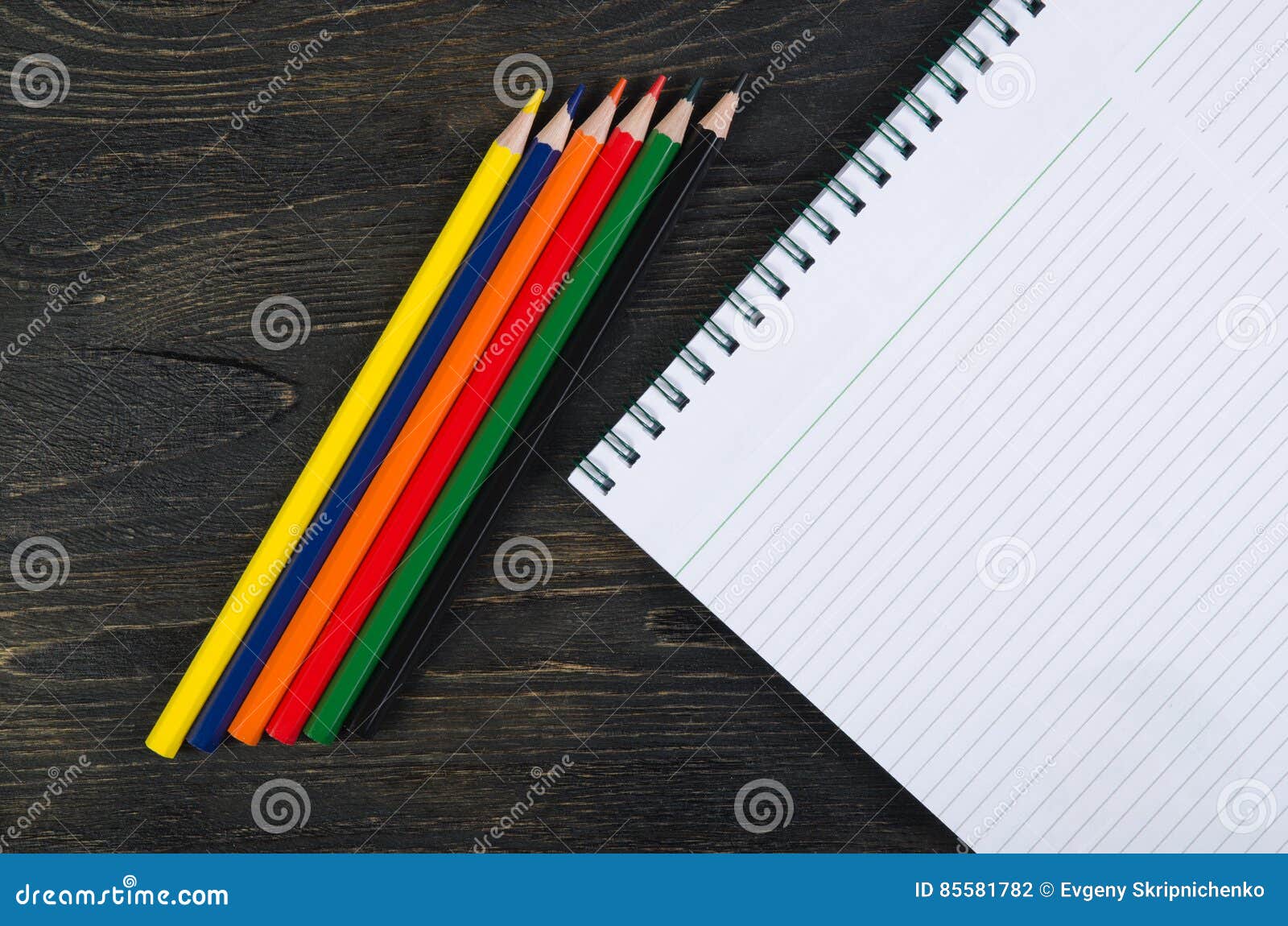 Colored Pencils and a Notebook Stock Photo - Image of crayon, copyspace ...