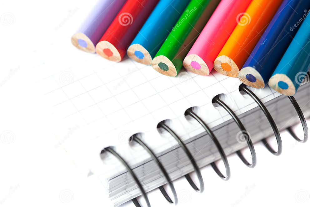 Colored Pencils and a Notebook Isolated on White Stock Photo - Image of ...