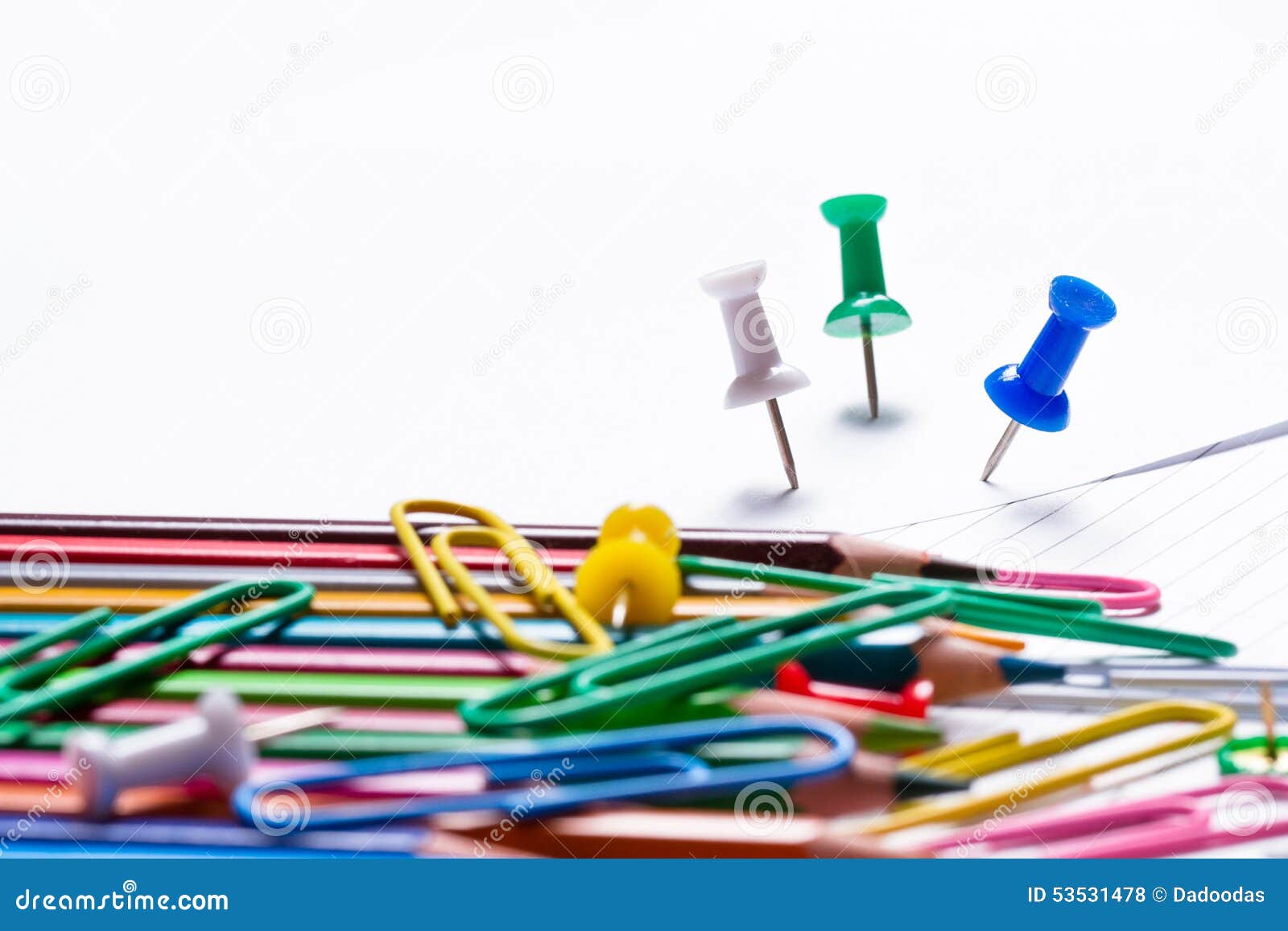 Colored Pencils, Paper Clips and Buttons Stock Photo - Image of notepad ...