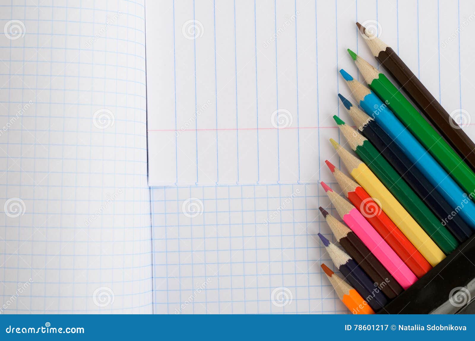 Colored pencils and paper stock image. Image of bright - 78601217