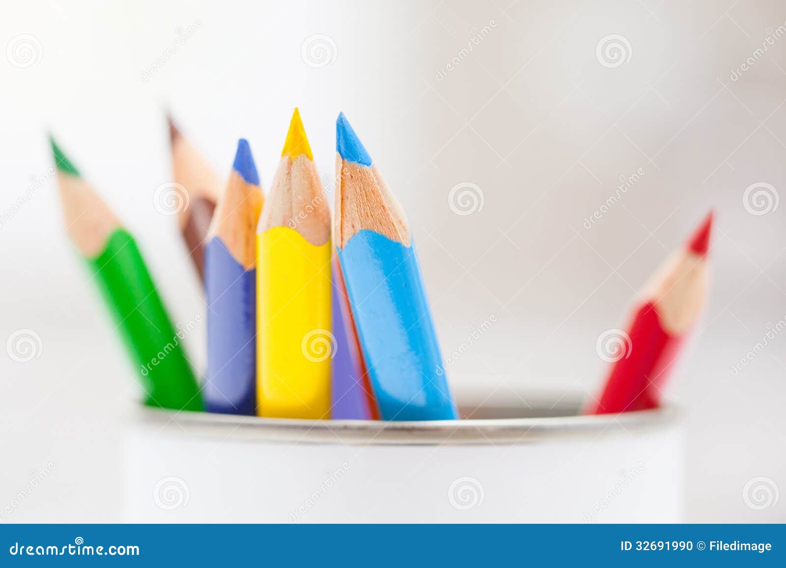 Colored Pencils in a Pot stock photo. Image of supplies - 32691990