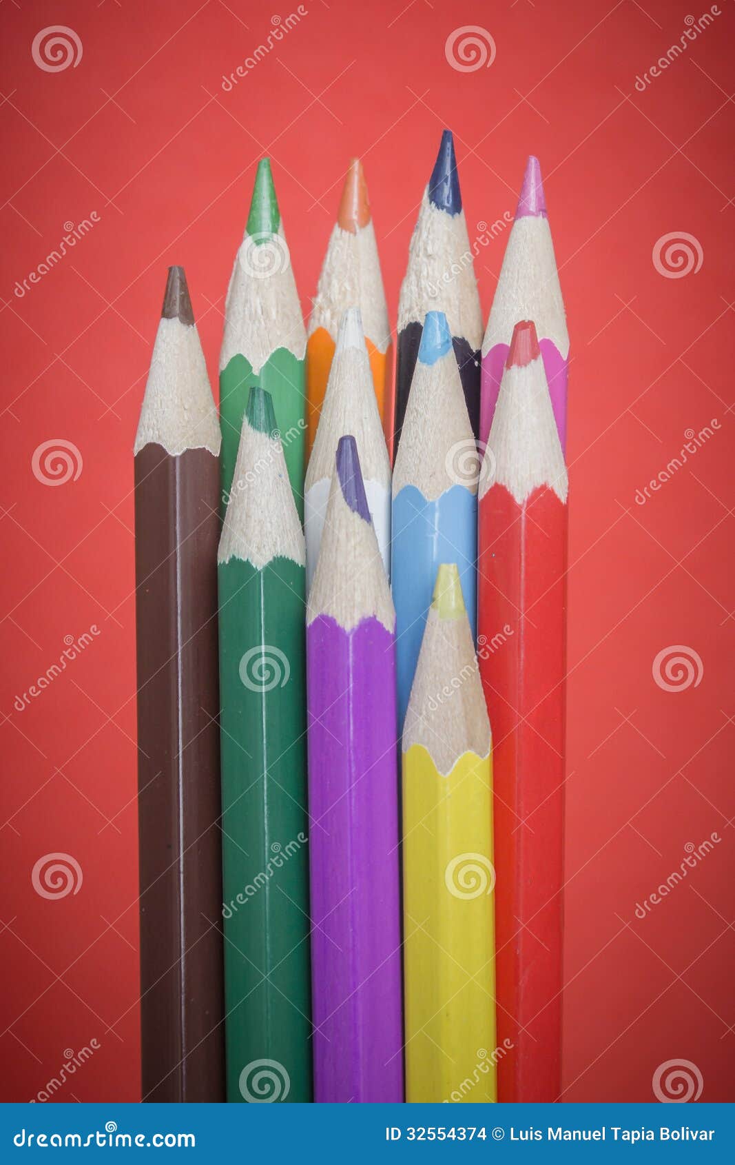 Colored Pencils on Red Background Stock Photo - Image of closeup ...