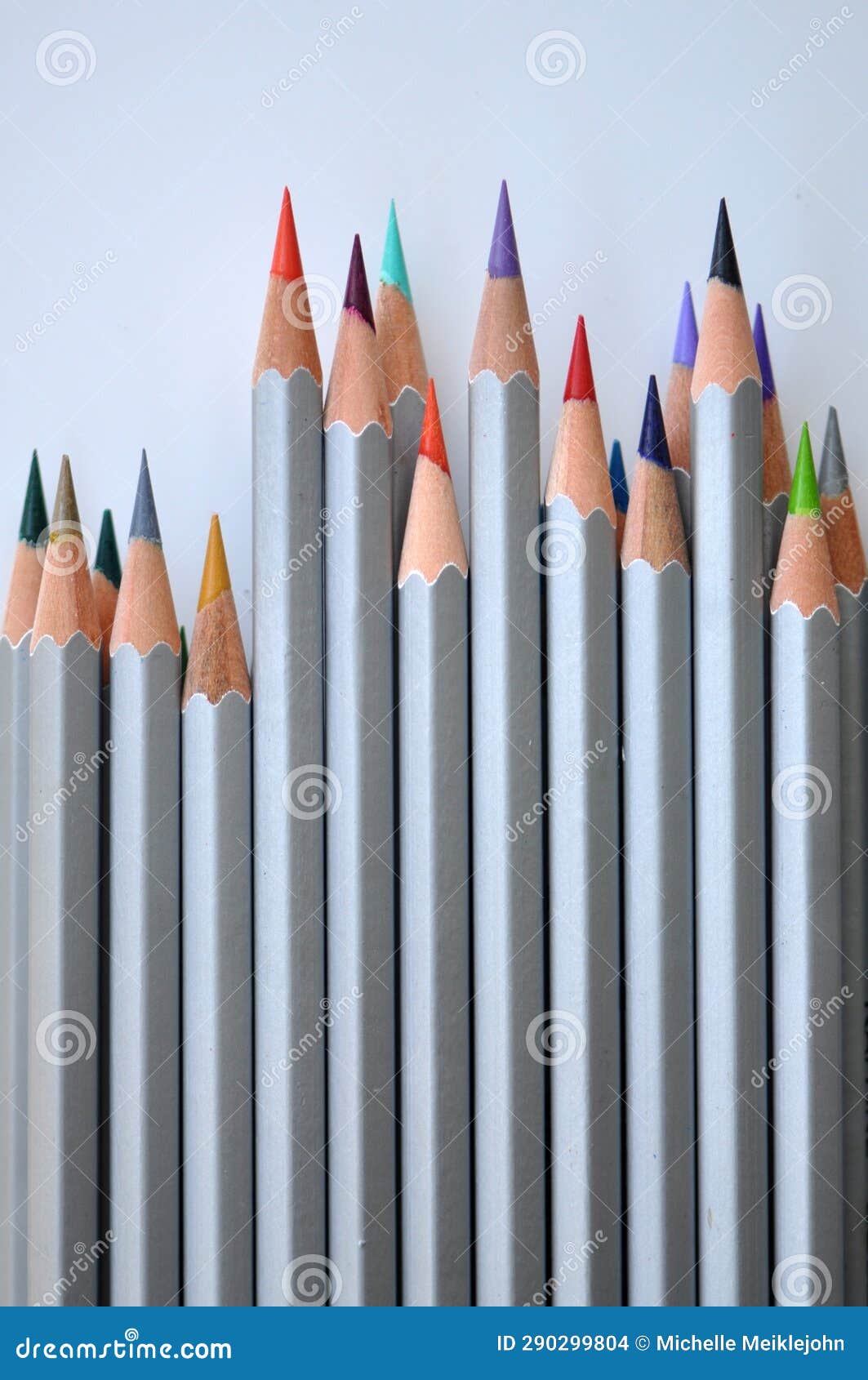 Colored pencils in a stack stock photo. Image of play - 290299804