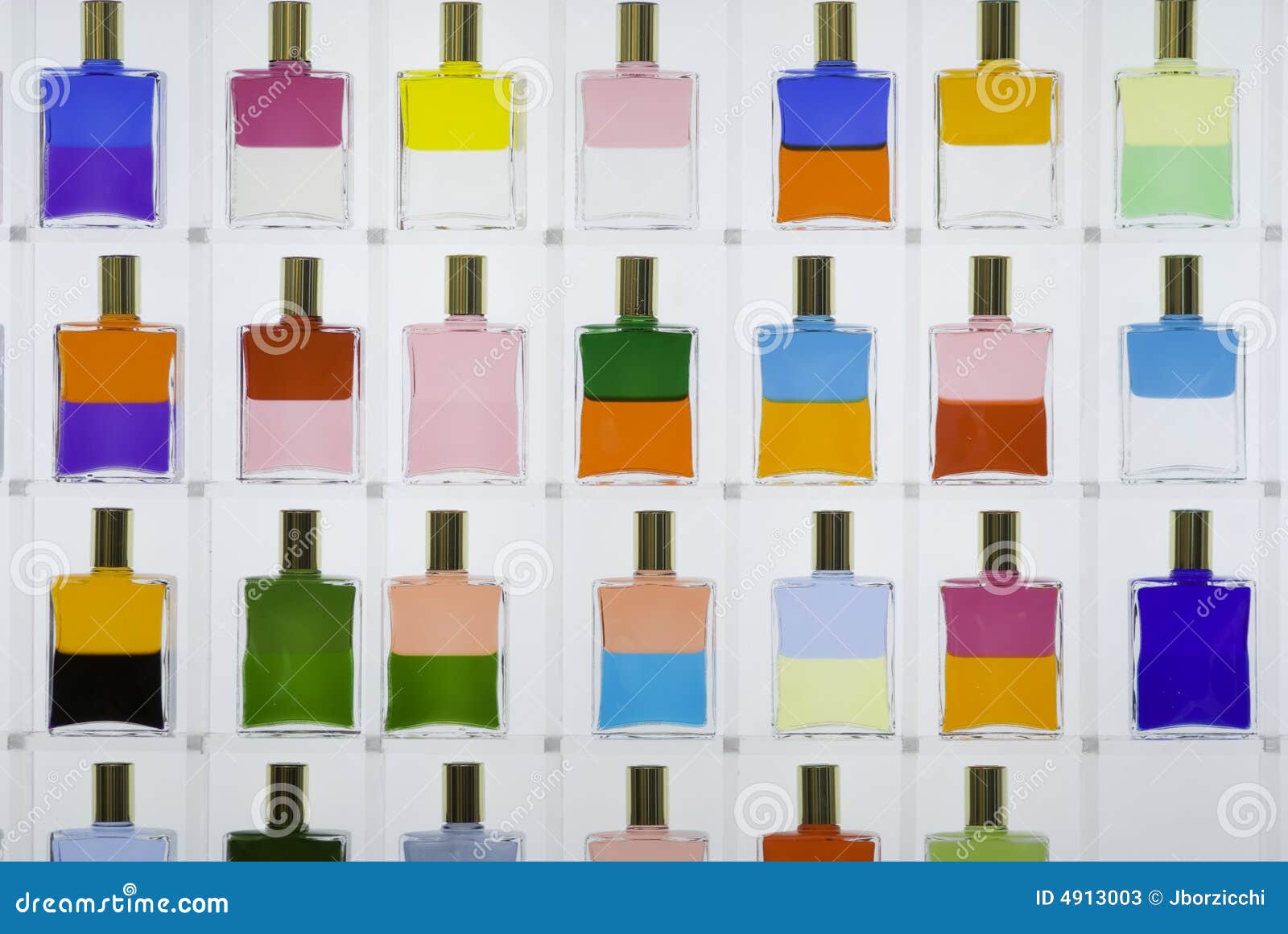 Colored perfume bottles stock image. Image of repetition - 4913003