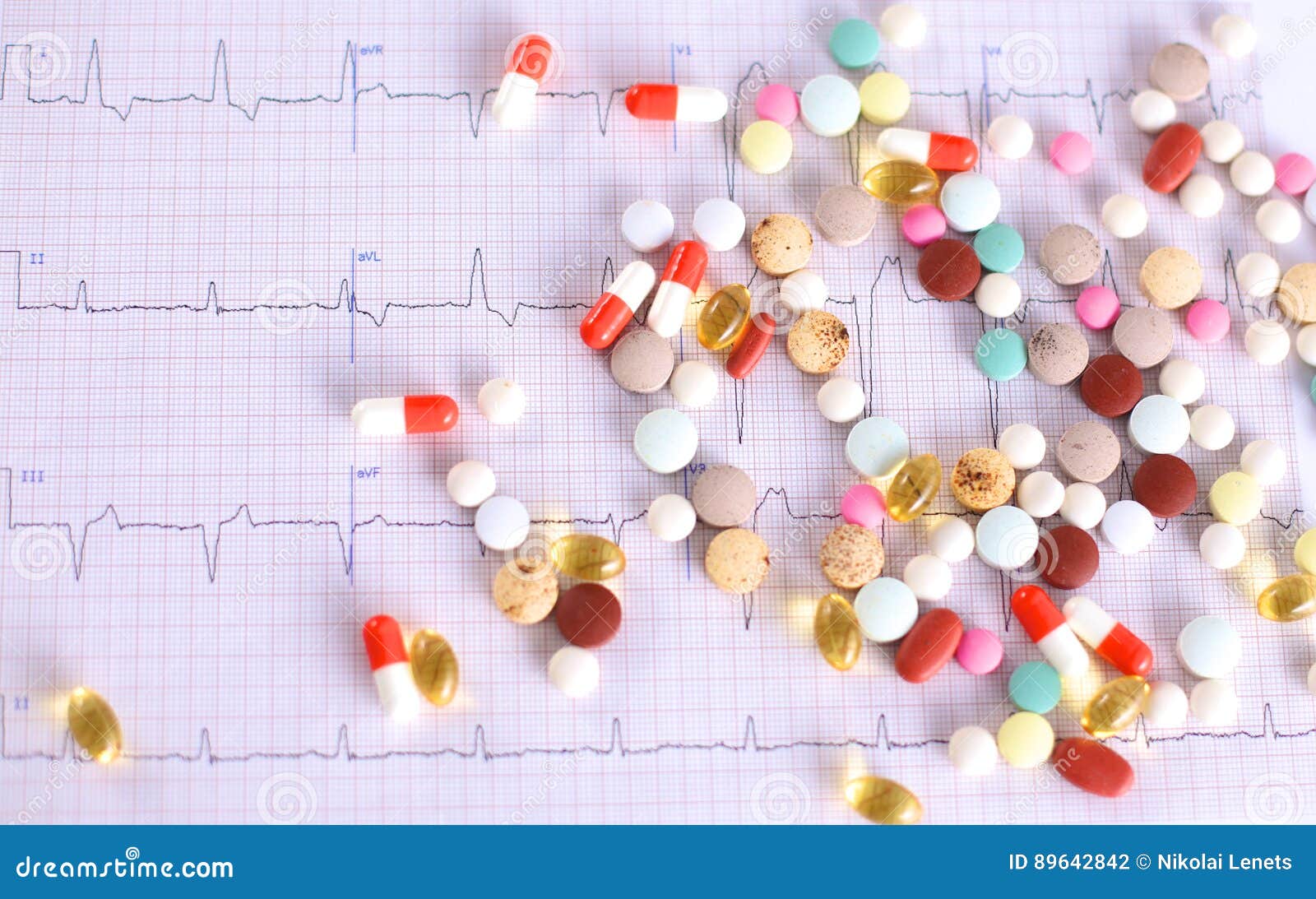 Colored Pills Lie on a Paper Cardiogram Stock Photo - Image of attack ...
