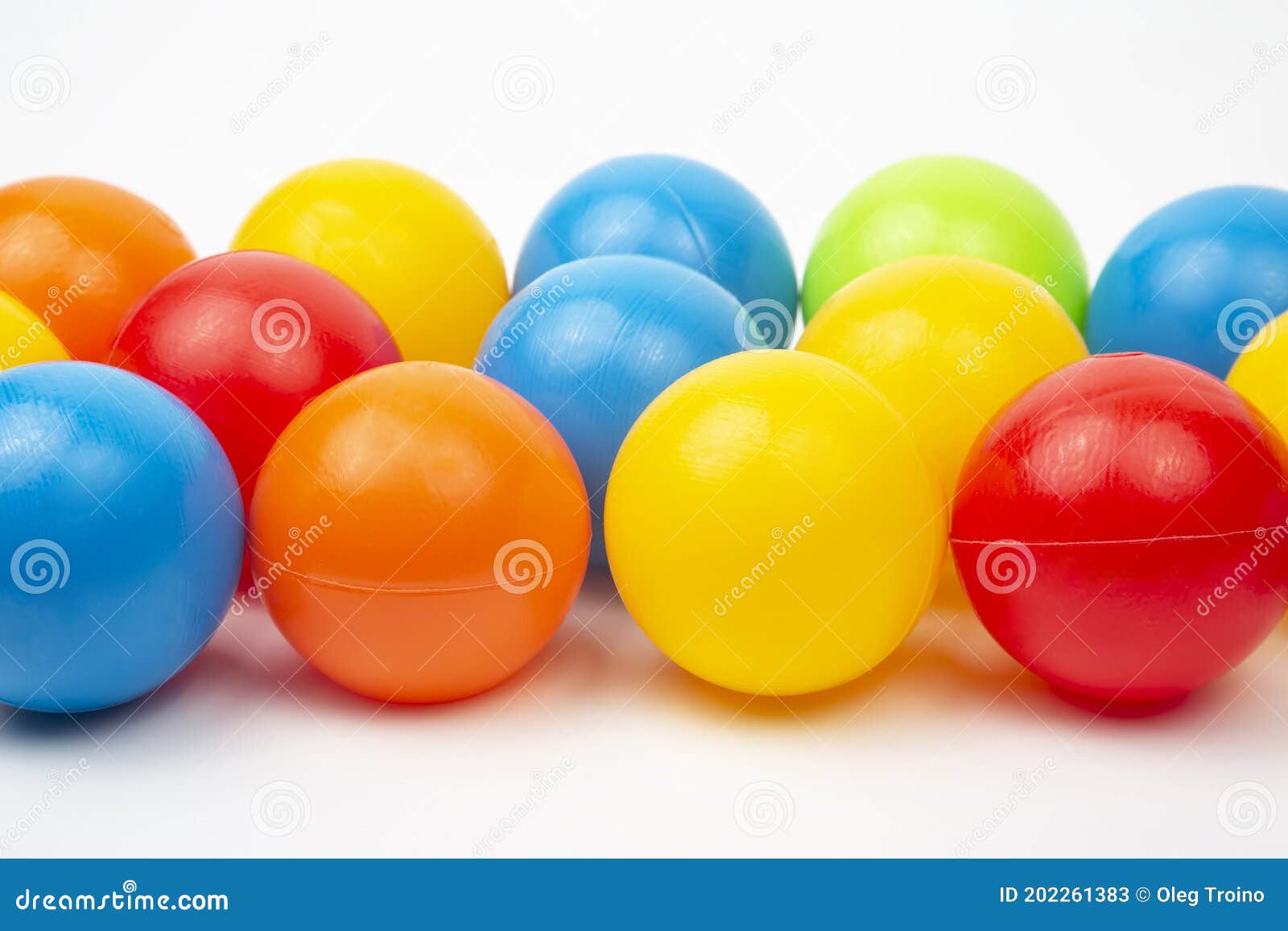 Colored Plastic Balls on White Background. Leisure and Game Items Stock ...