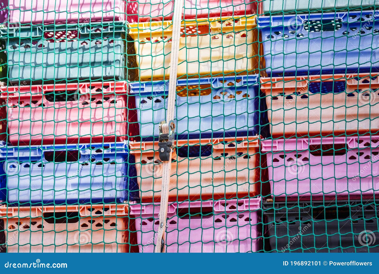 Colored Plastic Boxes for Transportation on a Lorry Fixed by Truck Net ...