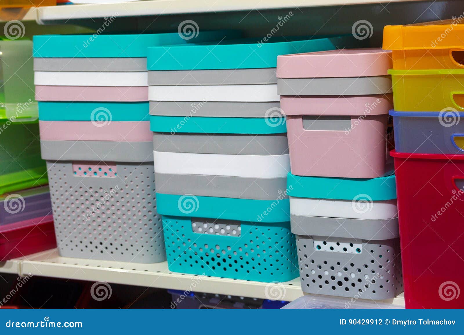 Colored Plastic Containers on the Counter of the Store Stock Photo ...