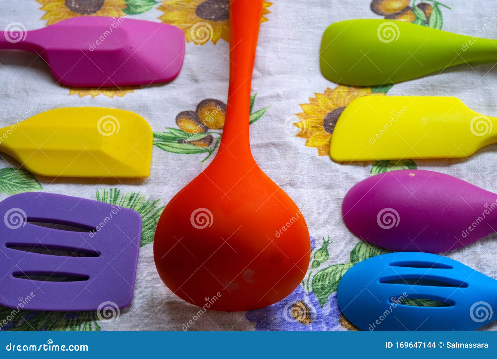 Colored plastic ladles stock photo. Image of variety - 169647144