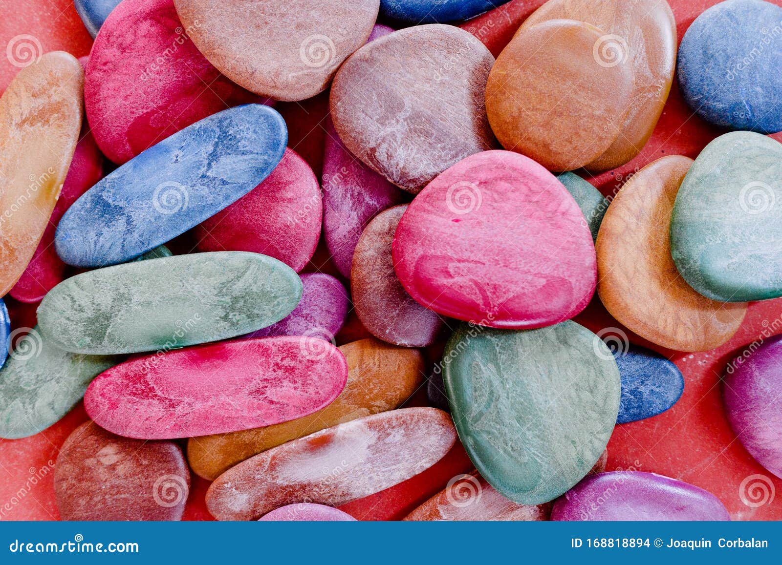 Colored Plastic Pebbles To Play Babies Stock Photo - Image of pebbles ...