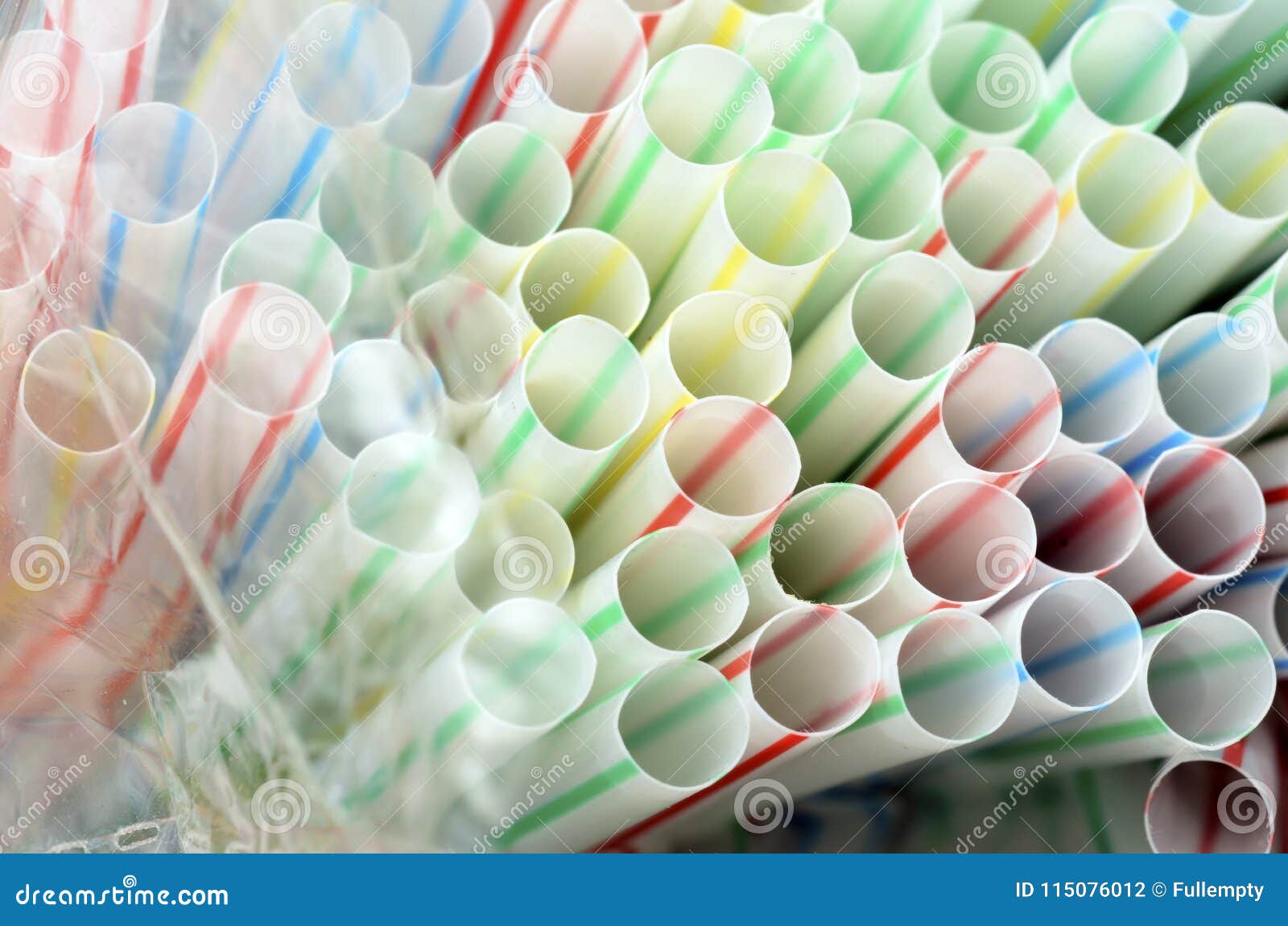 Colored plastic straws stock photo. Image of concept - 115076012