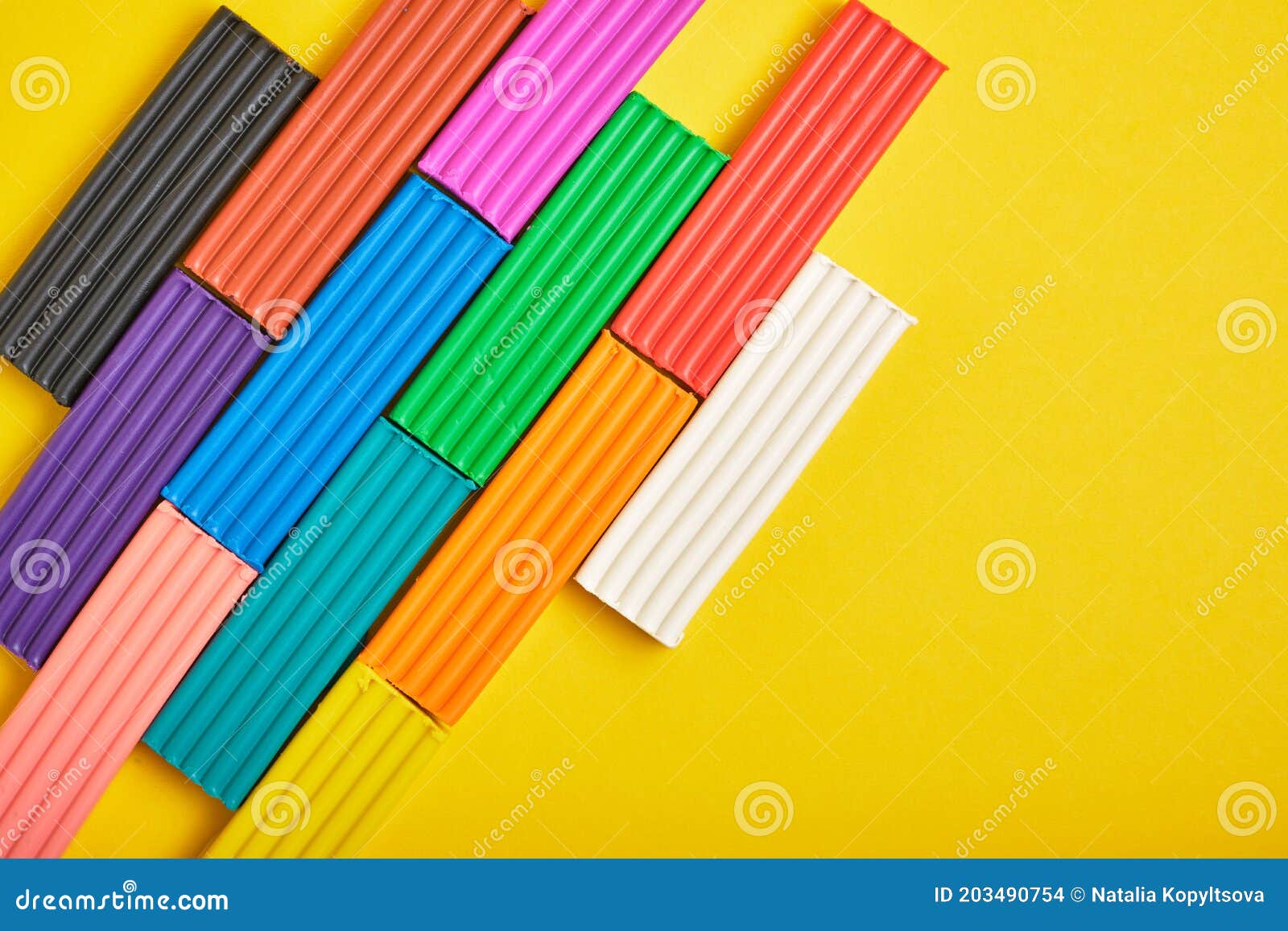 Colored Plasticine on Yellow Background Copy Space Stock Photo - Image ...