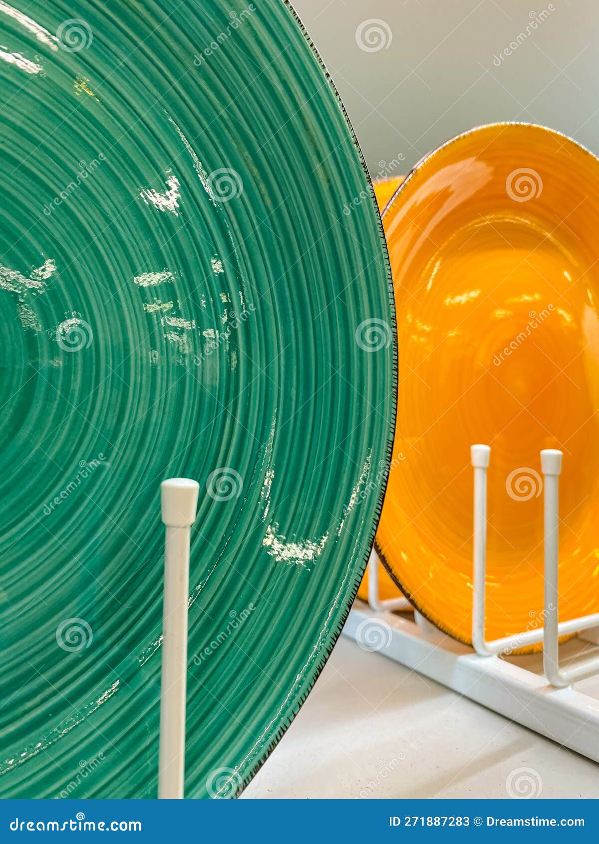 Colored Plates Close-up on the Showcase Stock Image - Image of colorful ...