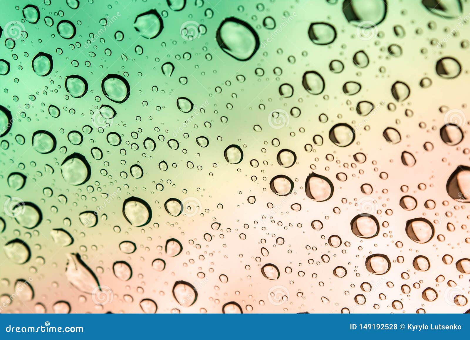 Colored raindrops on glass stock photo. Image of liquid - 149192528