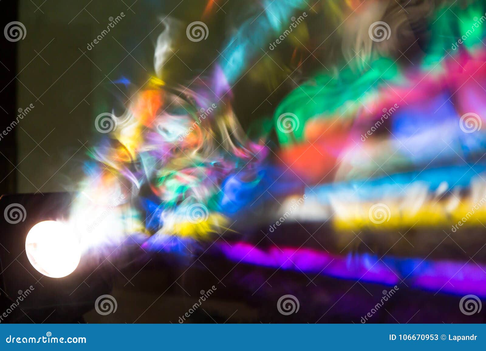 The Colored Rays of Light from the Searchlight through Smoke. a ...