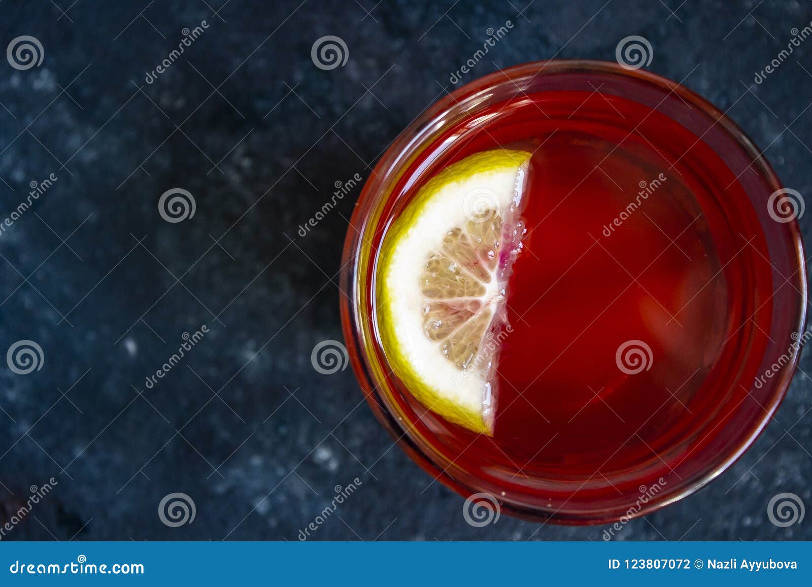 Colored Lemonade with Lemon on Dark Surface Stock Photo - Image of ...