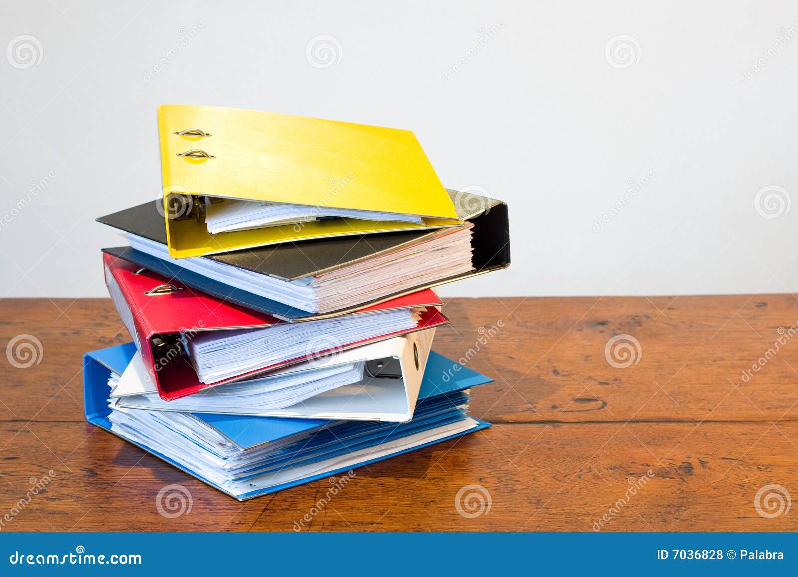 Colored Ring Binders on Wooden Desk Stock Photo - Image of organization ...