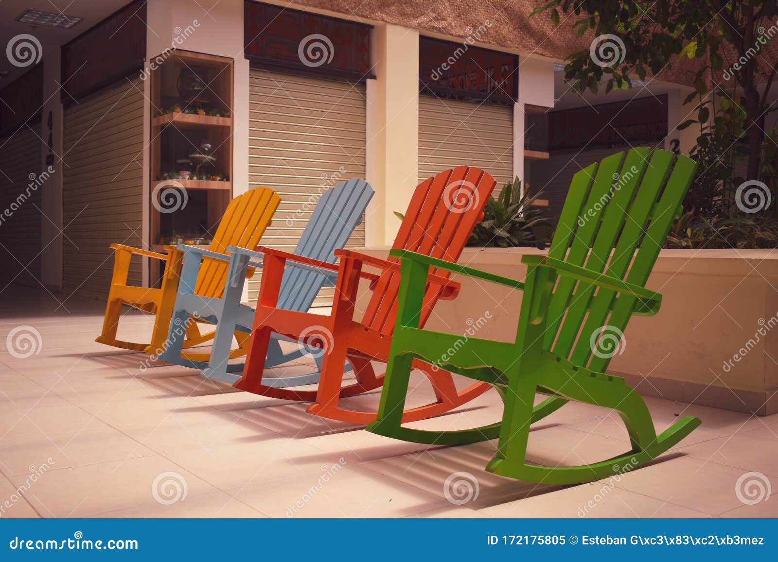 Colored Rocking Chairs in Mall Stock Image - Image of secuence, rocking ...