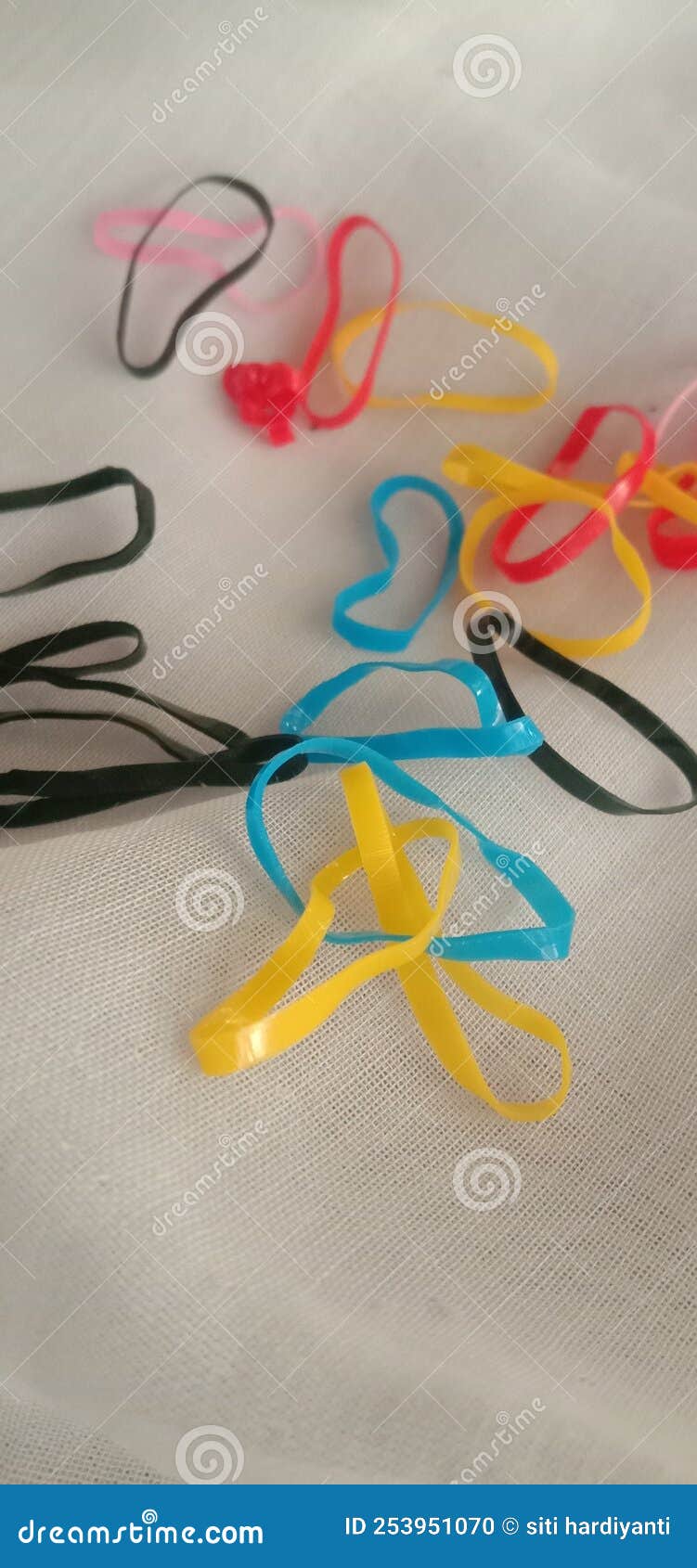 Colored Rubber Rope on White Cloth Stock Photo - Image of cloth, pink ...