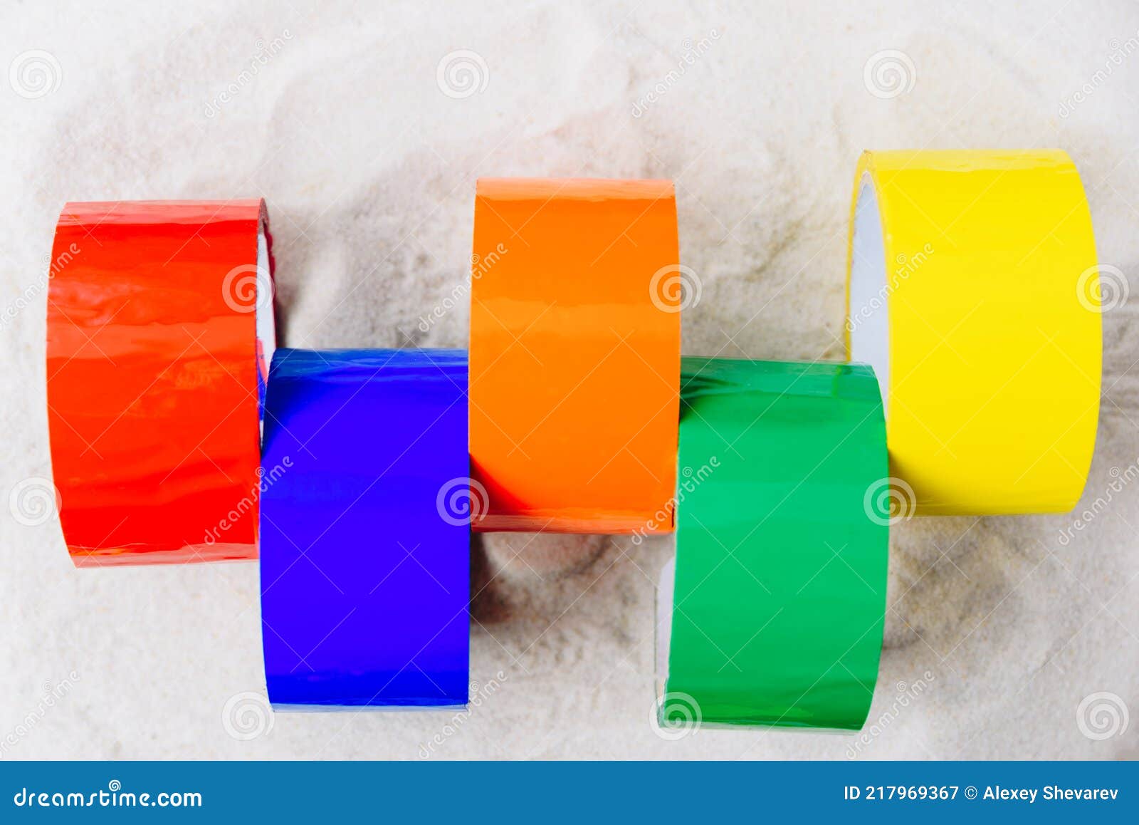 Colored Scotch Tape on White Sand Stock Image - Image of rolls ...