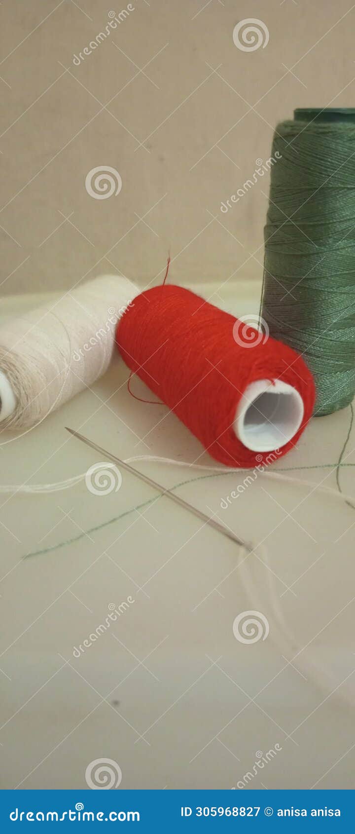 Colored Sewing Threads and Needles. Red White Gray Stock Image - Image ...