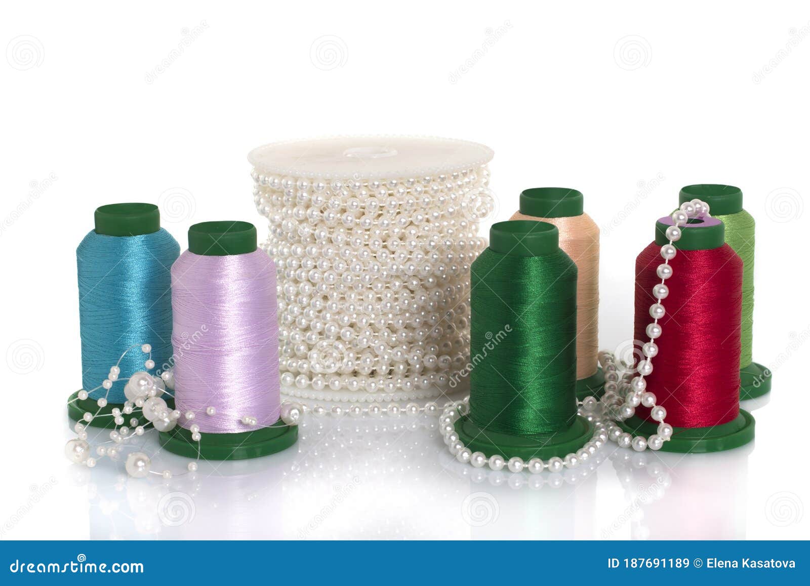 Colored Silk Threads, Pearls. Goods for Needlework on a White ...