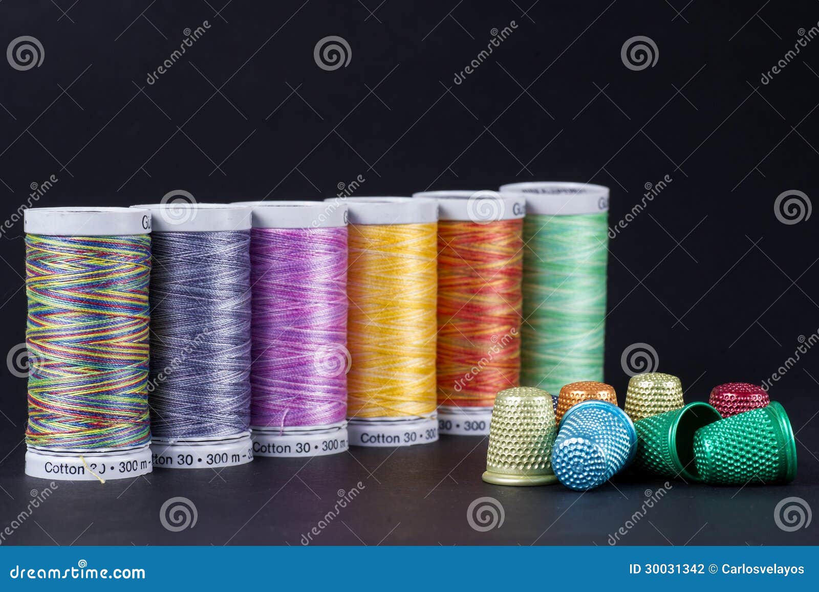 Colored Spools and Thimbles Stock Photo - Image of wool, clothing: 30031342