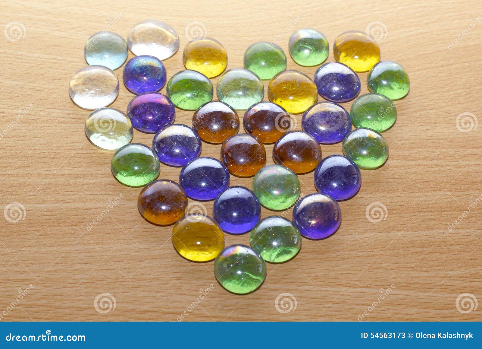 Colored Stones on a Wooden Table Stock Image - Image of cluster, yellow ...