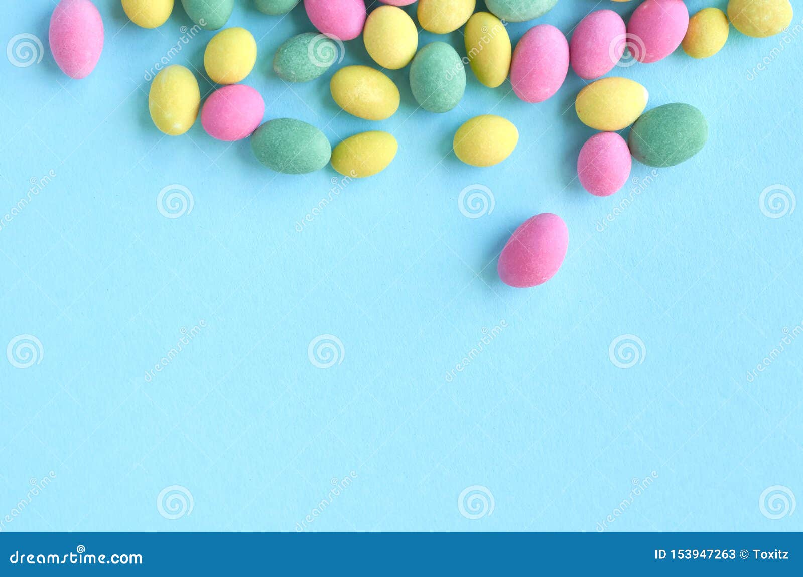 Colored Sweets, Peanut Covered with Glaze on Blue Background ...