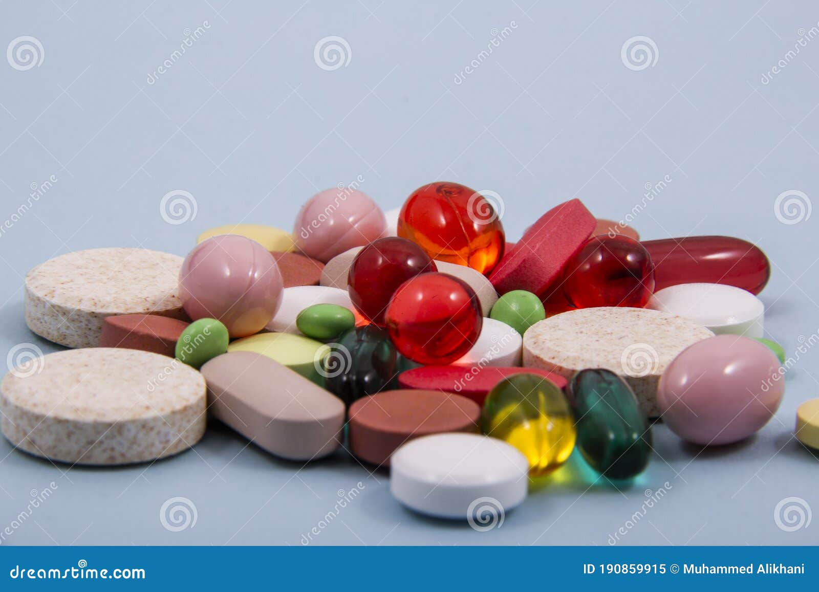 Colored Tablets And Capsules Are Removed From The Package. Colored ...