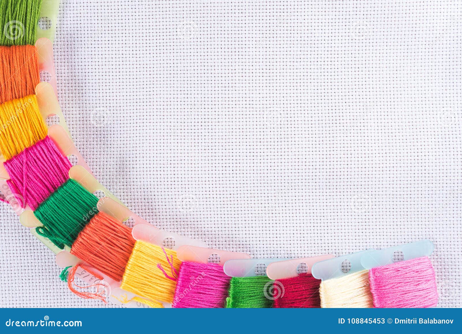 Colored Thread for Embroidery on White Canvas. Copy Spase. Stock Image ...