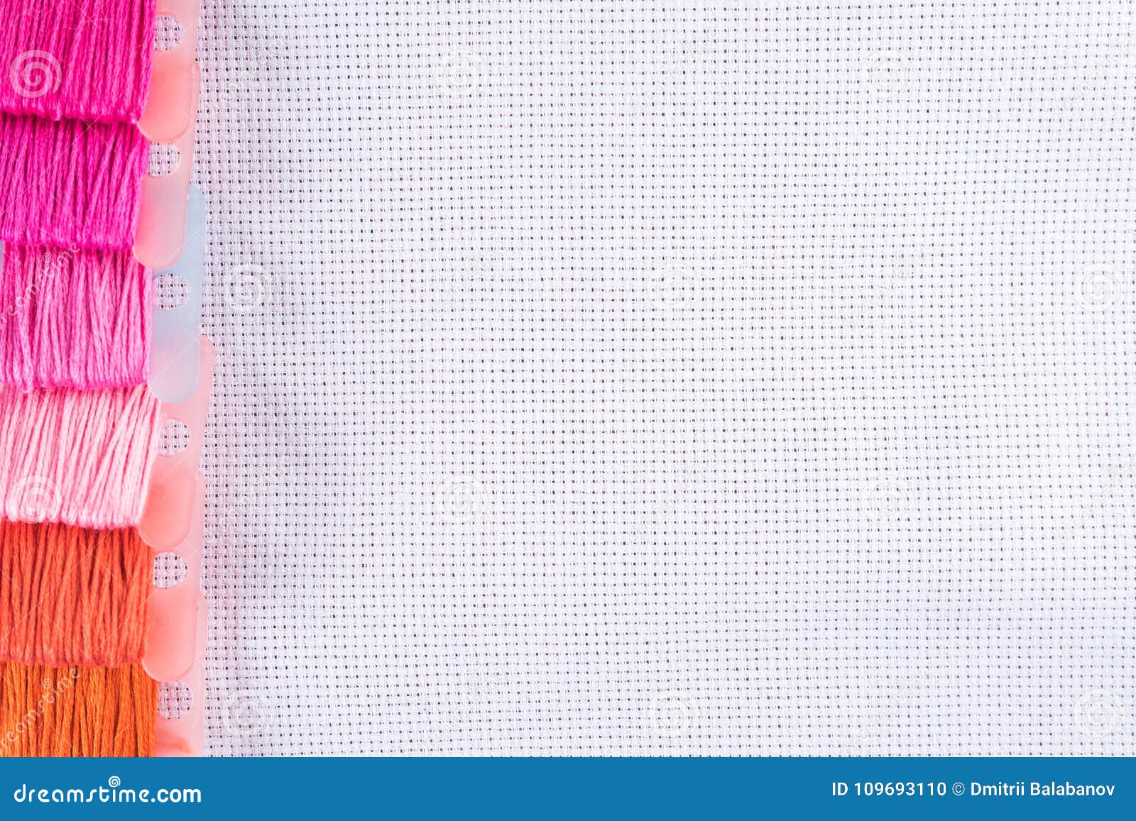 Colored Thread for Embroidery on White Canvas. Copy Spase. Stock Photo ...