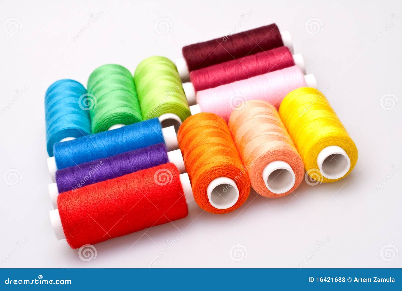 Colored thread for sewing stock photo. Image of rainbow - 16421688