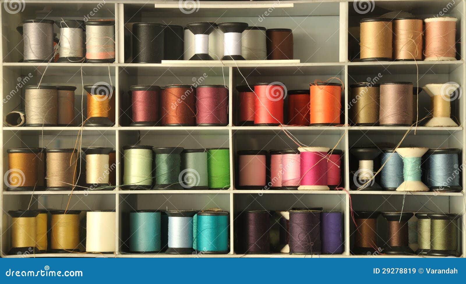 Colored thread on shelf stock image. Image of bobbin - 29278819