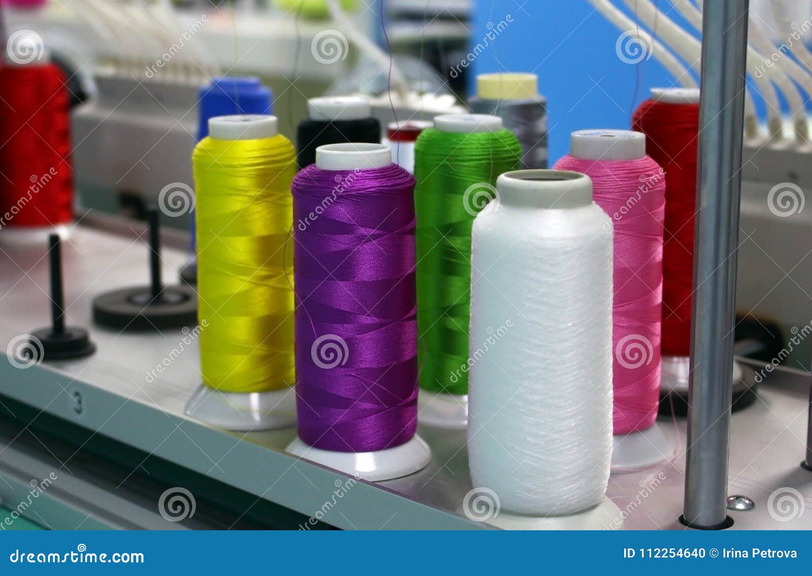 Colored Threads for Embroidery Machines Stock Photo - Image of ...