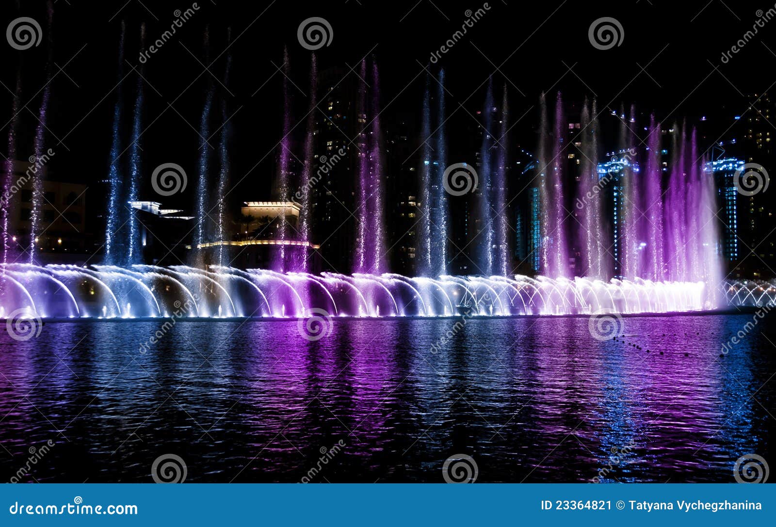 Colored Water Fountain at Night Stock Image - Image of black, purity ...