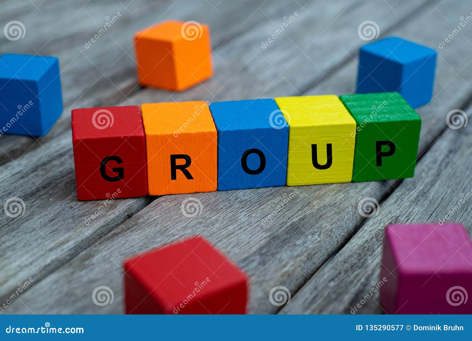 Colored Wooden Cubes with Letters. the Word Group is Displayed ...