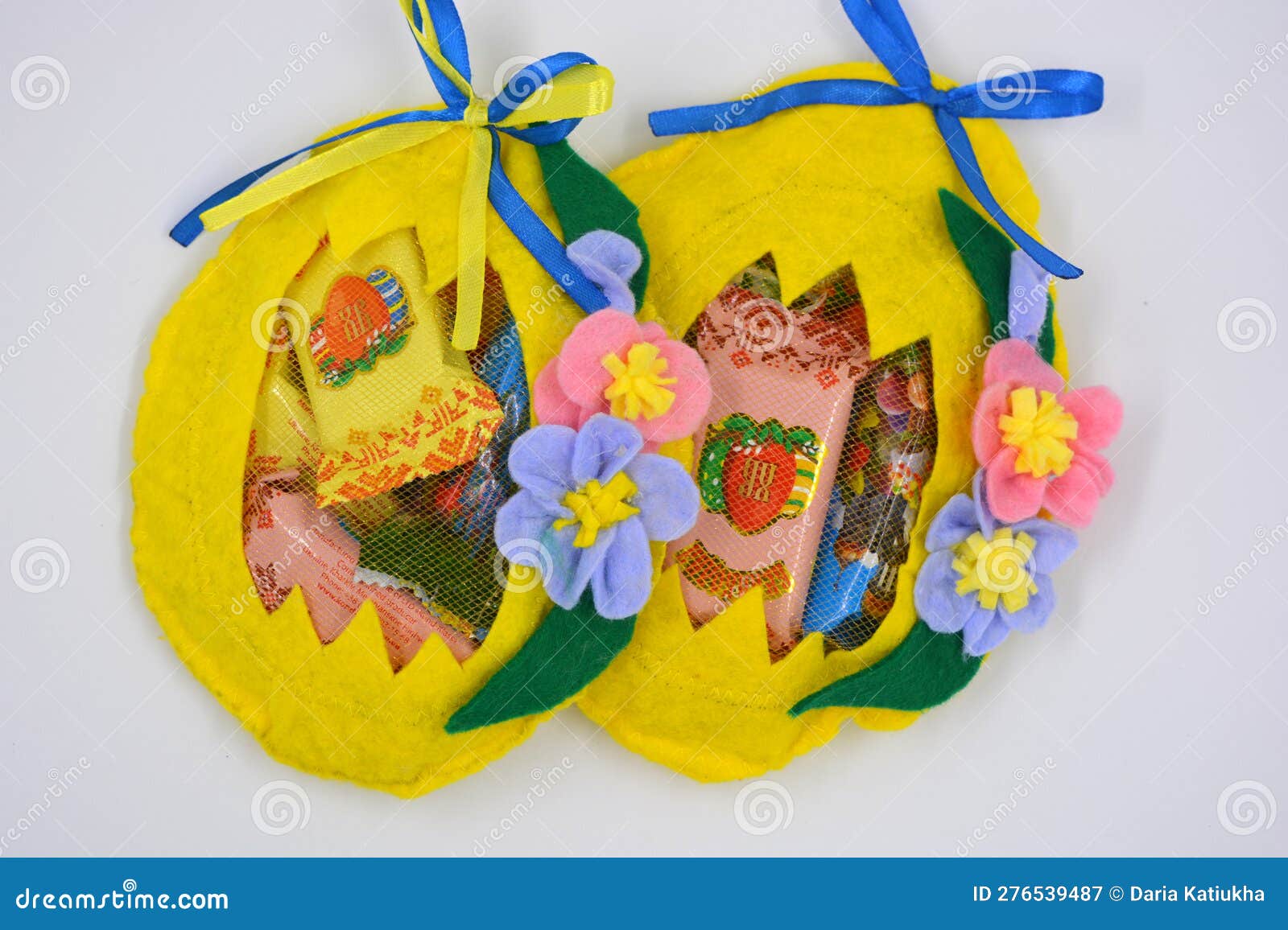 Colored Yellow Packages with Sweets Packed in the Form of an Egg Made ...