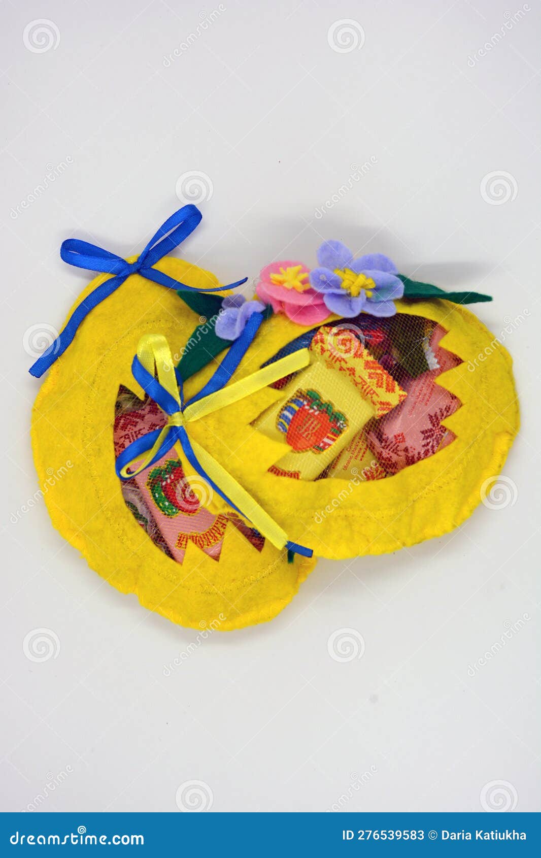 Colored Yellow Packages with Sweets Packed in the Form of an Egg Made ...