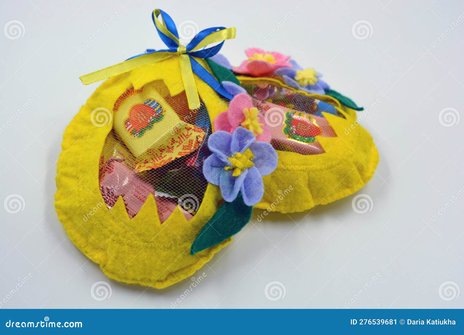 Colored Yellow Packages with Sweets Packed in the Form of an Egg Made ...